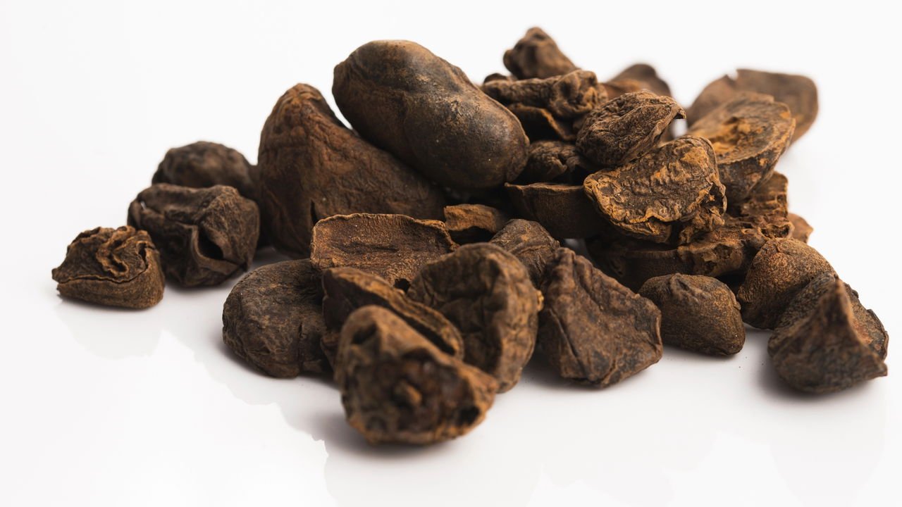 Noz de cola: as propriedades e usos do fruto
